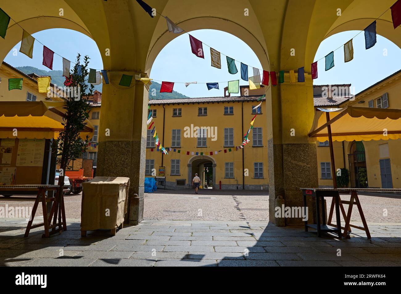 A wonderful courtyard decorated with colorful multi colored flags for a ...