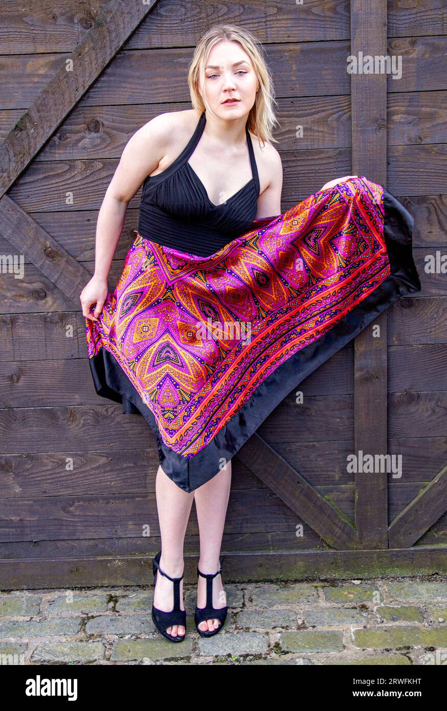 Hayleigh Young, a beautiful and fashionable woman posing for photo near ...