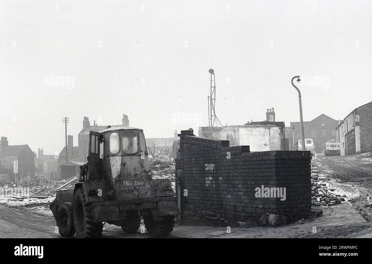 1960s, historical, wintertime and demolition and ground clearance of ...