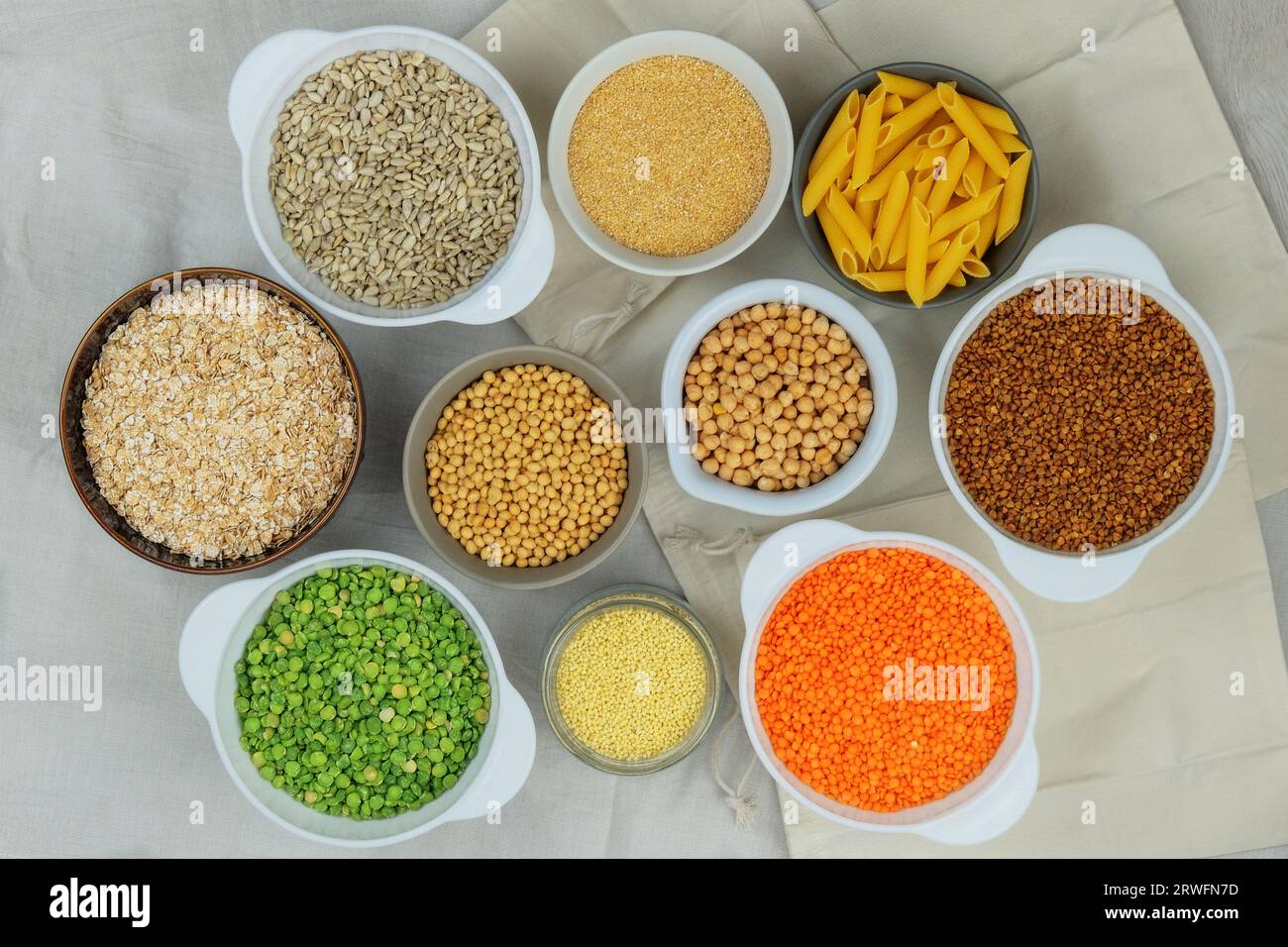 Set of vegetarian organic products in bowls on a white background ...
