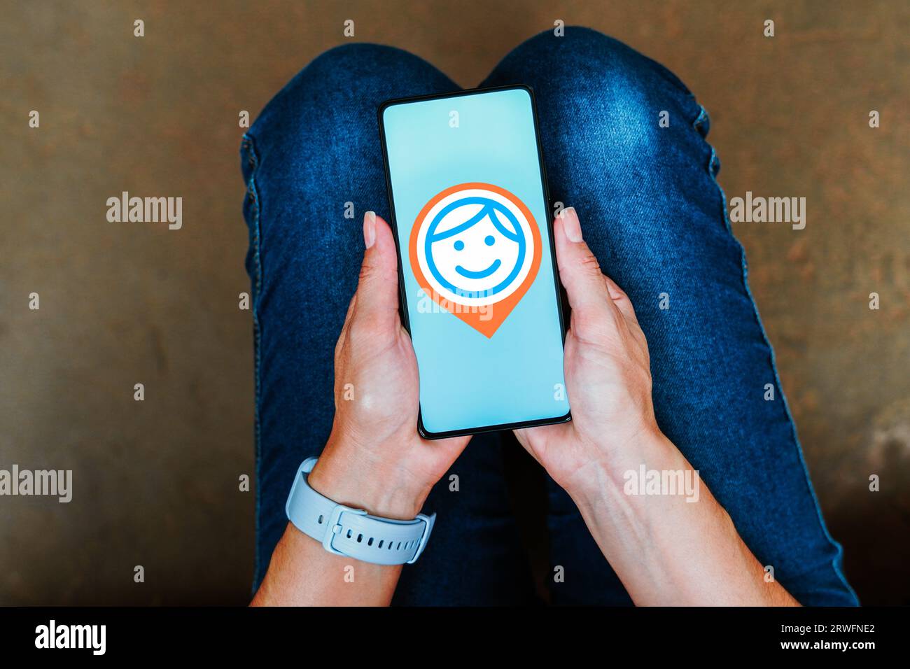 In this photo illustration, the iSharing logo is displayed on a ...