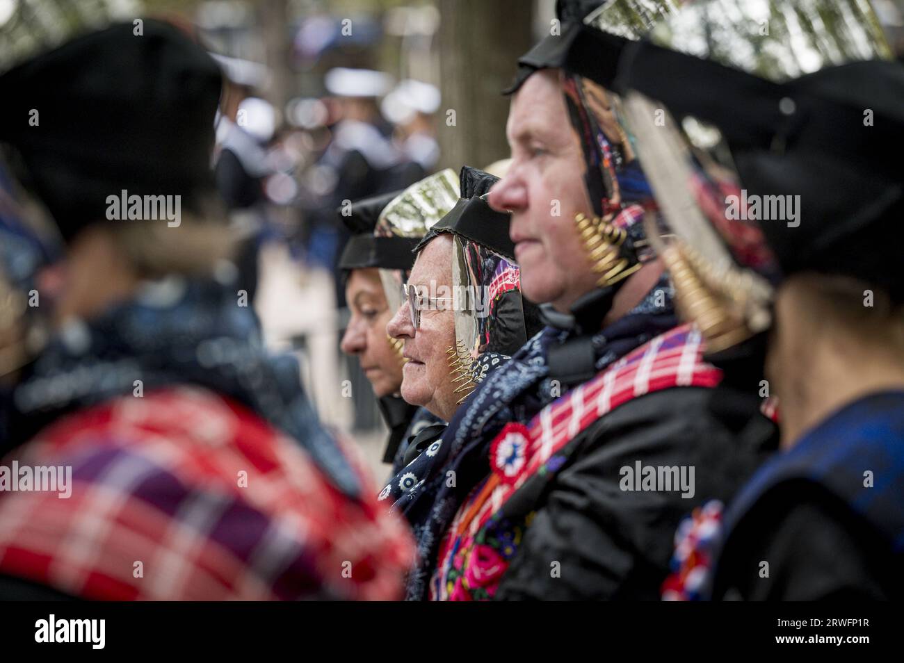 THE HAGUE - Staphorst women in traditional costumes along the route in ...