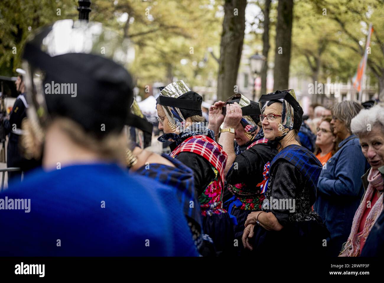 THE HAGUE - Staphorst women in traditional costumes along the route in ...