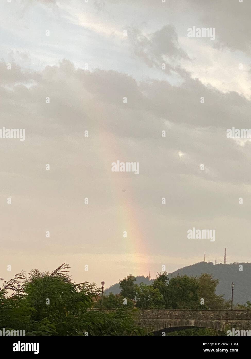 Sunset with a double rainbow arch Stock Photo - Alamy
