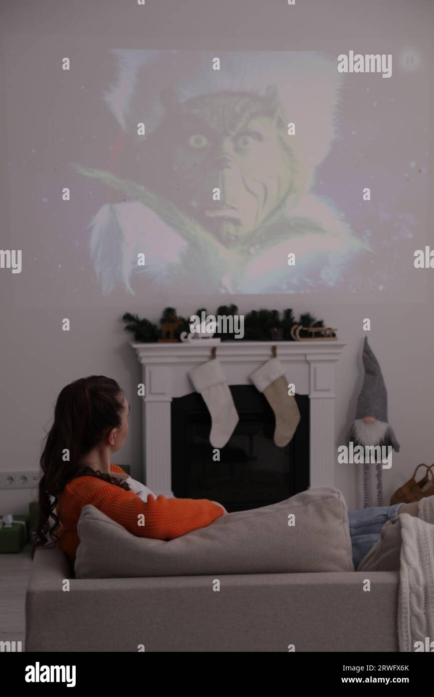 Lviv, Ukraine – January 24, 2023: Woman watching How the Grinch Stole ...