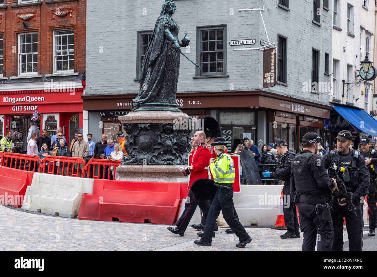 Windsor, UK. 19 September, 2023. A Grenadier guardsman is escorted to ...