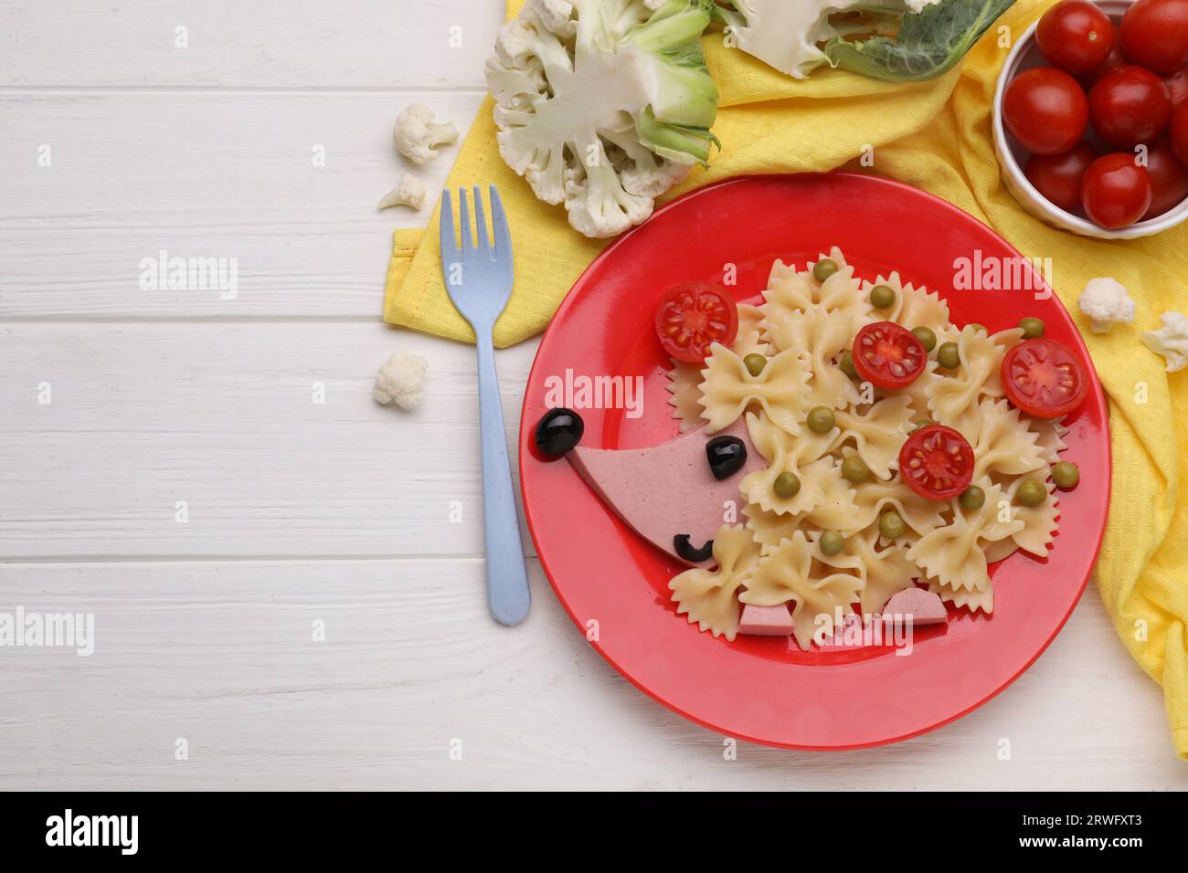 Creative serving for kids. Plate with cute hedgehog made of delicious ...