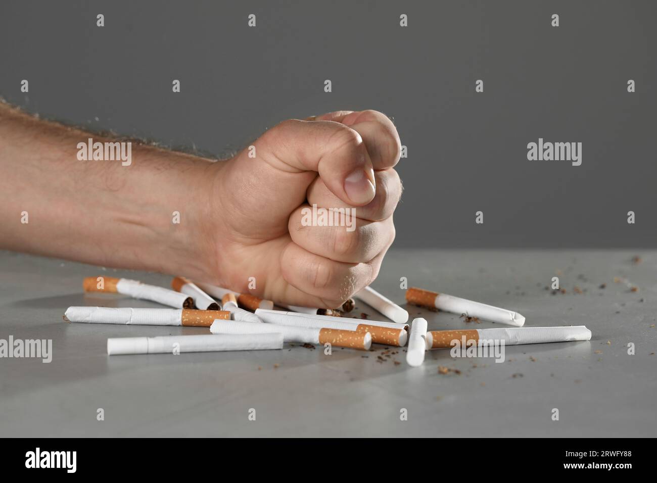 Man crushing cigarettes not woman hi-res stock photography and images ...