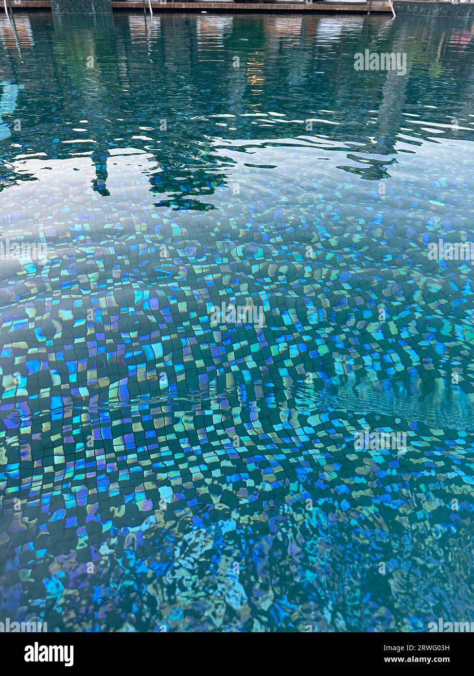 Clear refreshing water in outdoor swimming pool Stock Photo - Alamy