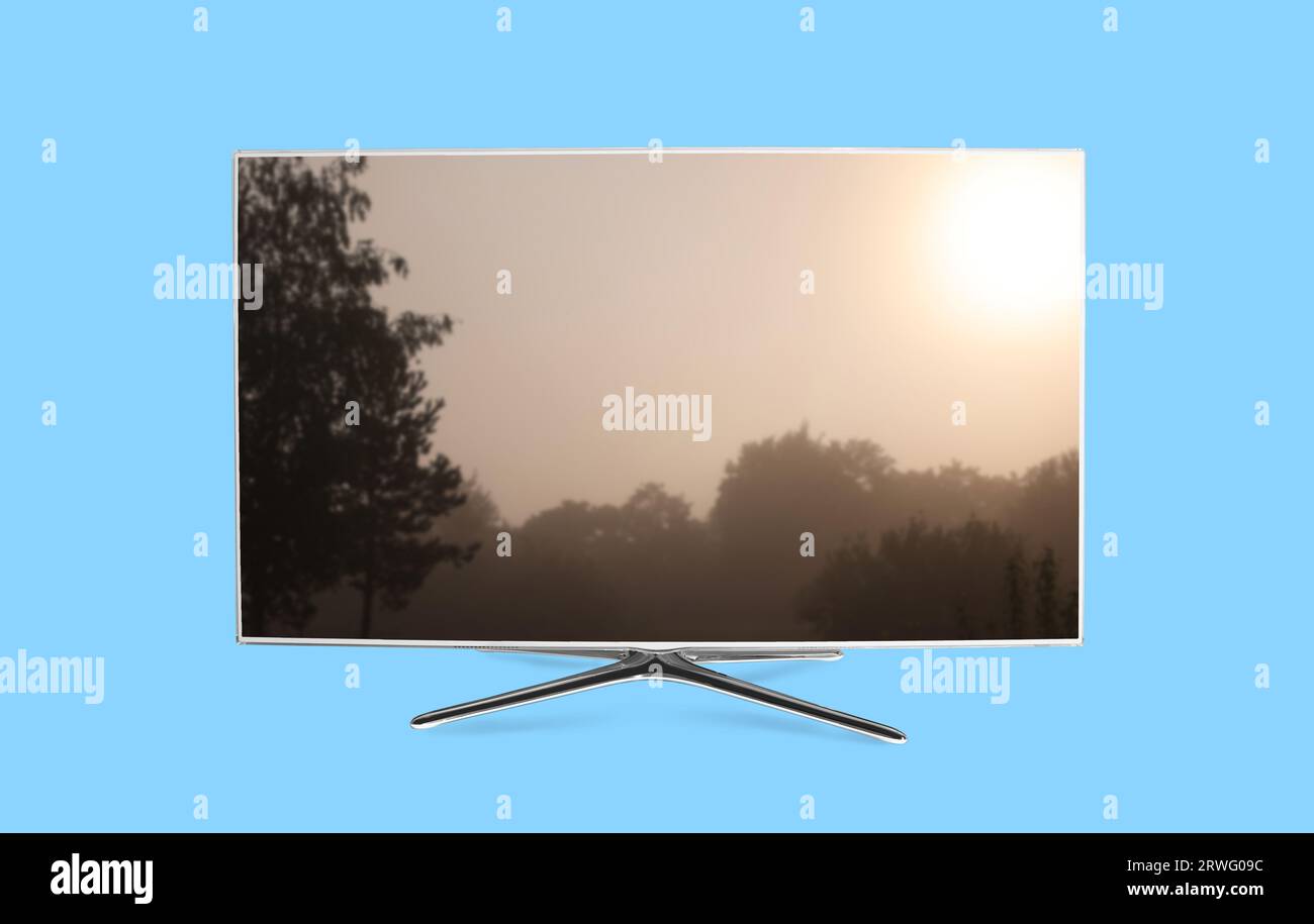 TV screen with movie frame on light blue background Stock Photo - Alamy