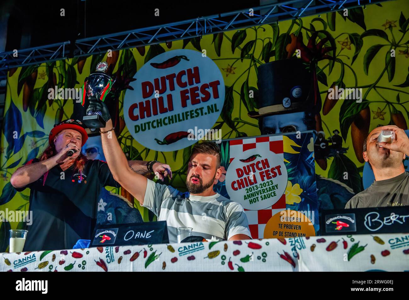 The winner of one of the rounds seen raising his trophy. The pepper ...