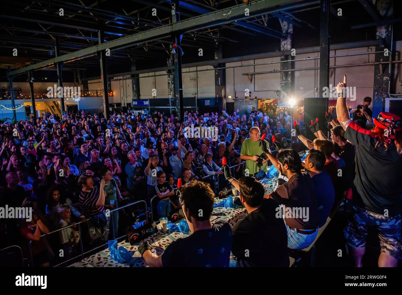 Participants are seen showing their peppers to the audience before ...