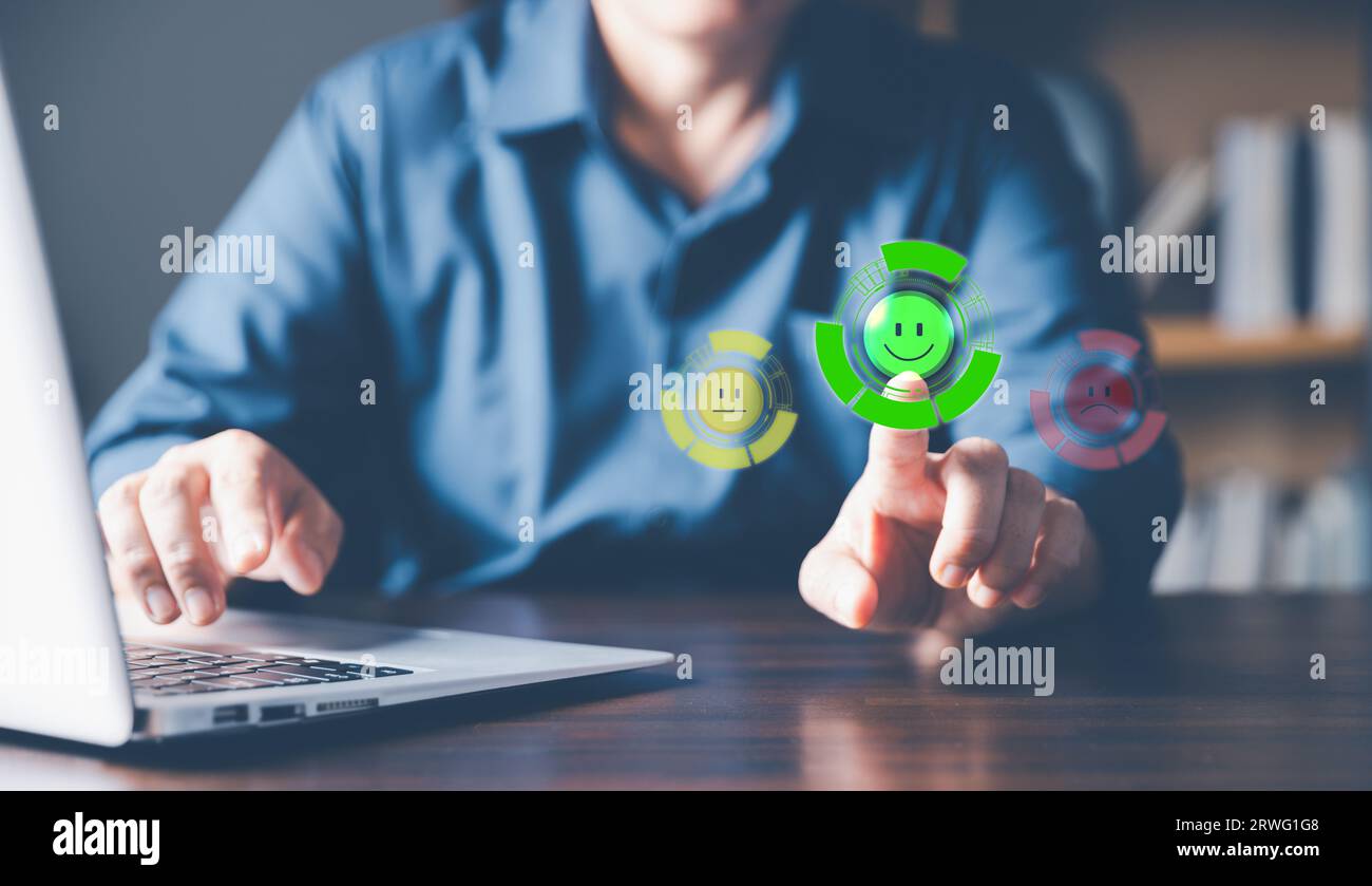 Hand of client show a feedback with smiley face. Service rating ...