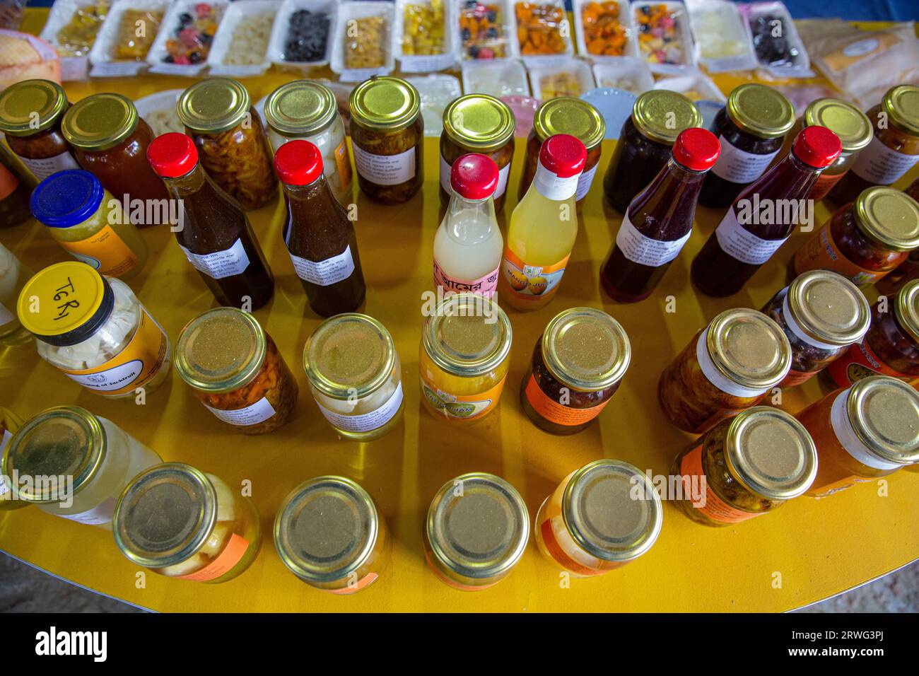 Different types of fruits jelly and pickles are display at a stall of ...
