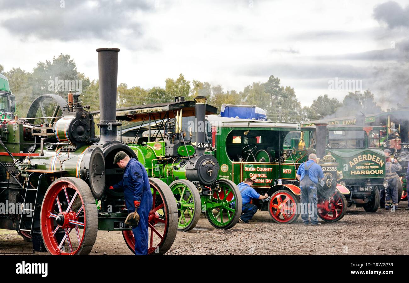 Boat of Garten Scotland steam rally men maintaining the colourful ...