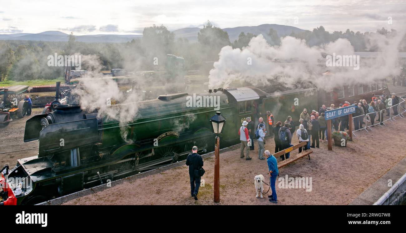 Flying Scotsman steam train at Boat of Garten Scotland visitors waiting ...