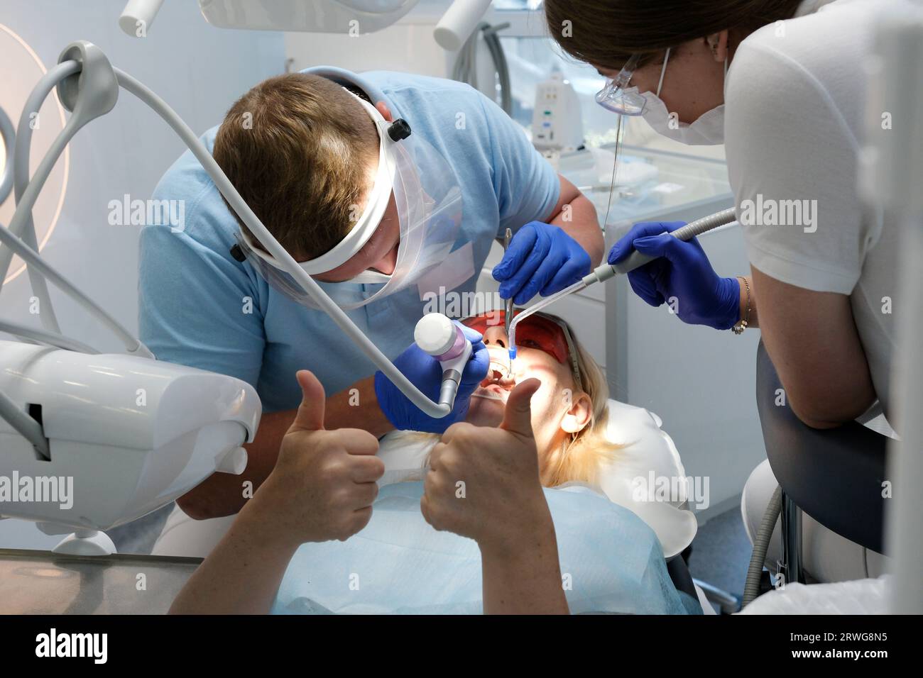 professional teeth cleaning in a dental clinic, removing stones and ...