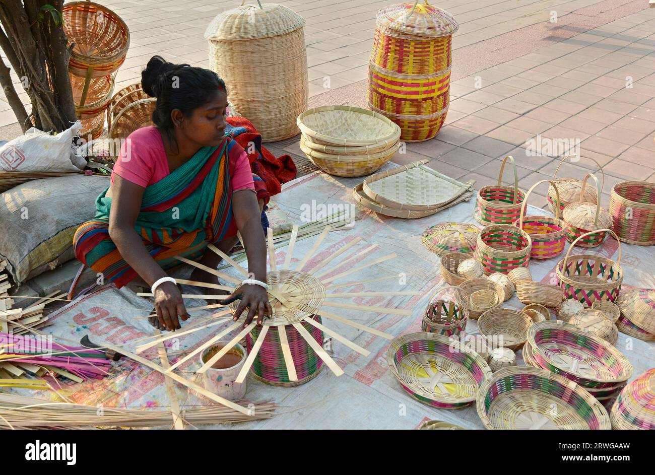 The Bengali women and men were making hand painting on the selling ...