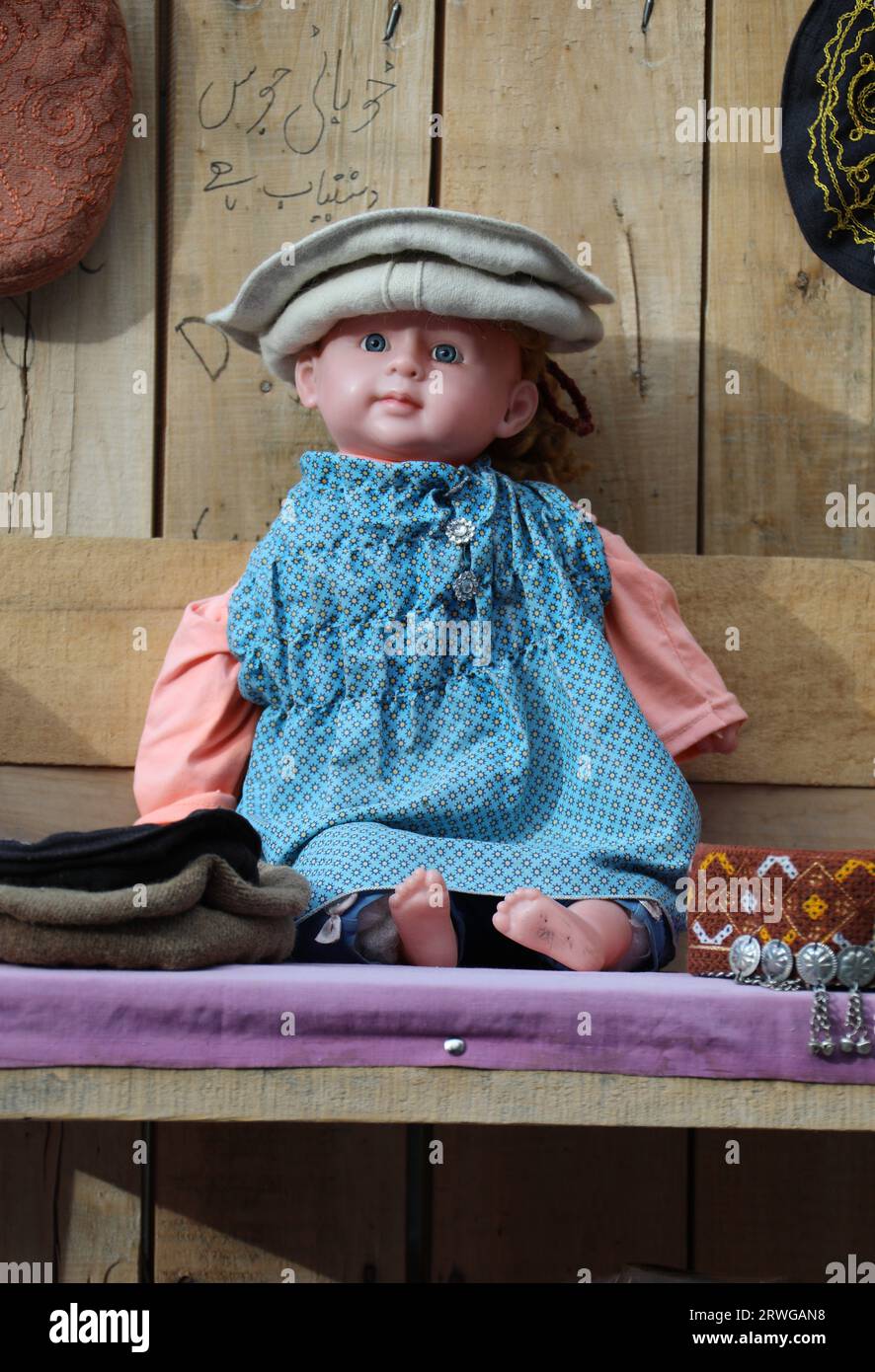 Doll wearing a traditional Pakistani pakol hat in a souvenir shop Stock ...