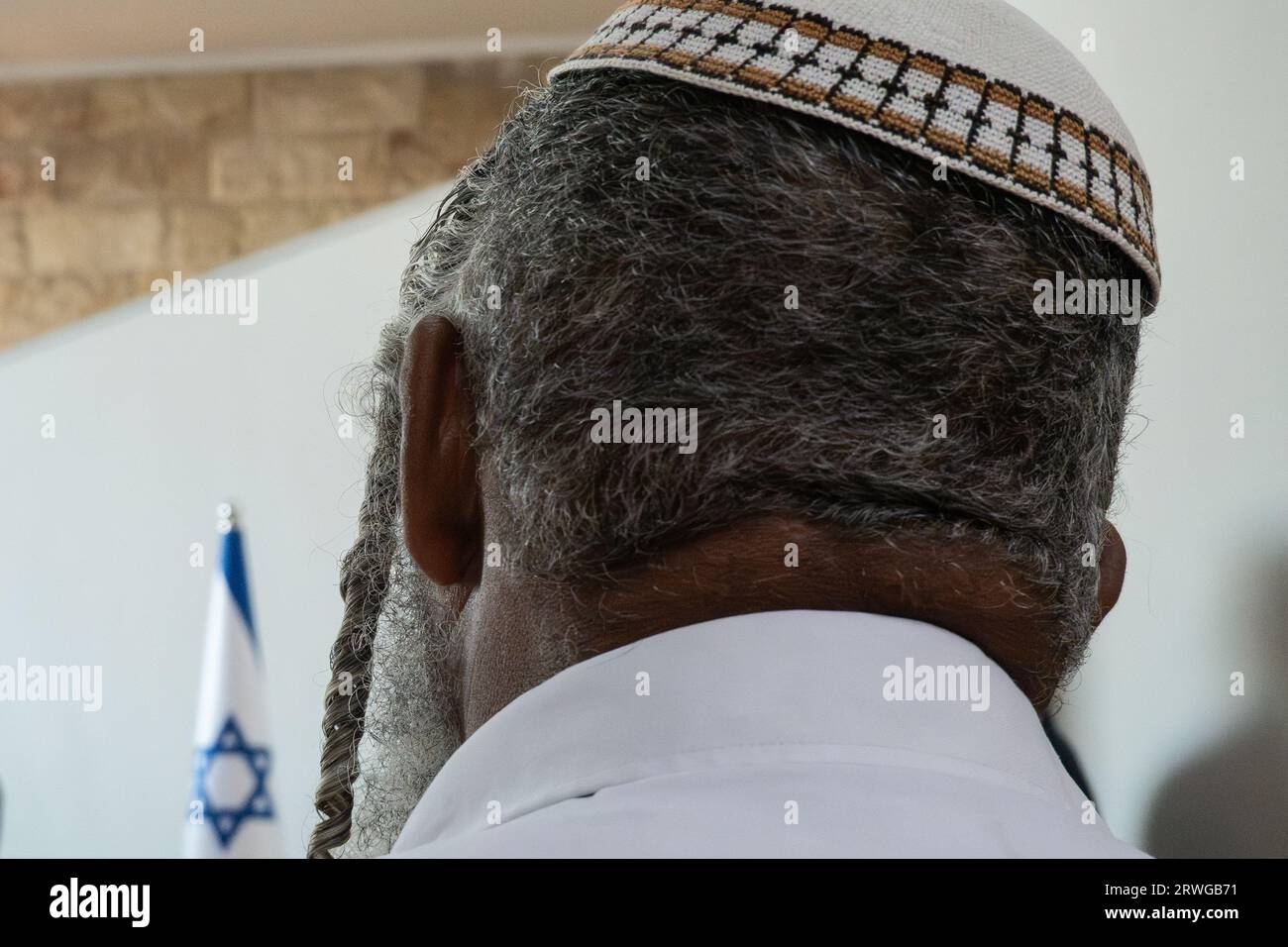 Back of the head of a religious Jewish man with dreadlocks and wearing ...