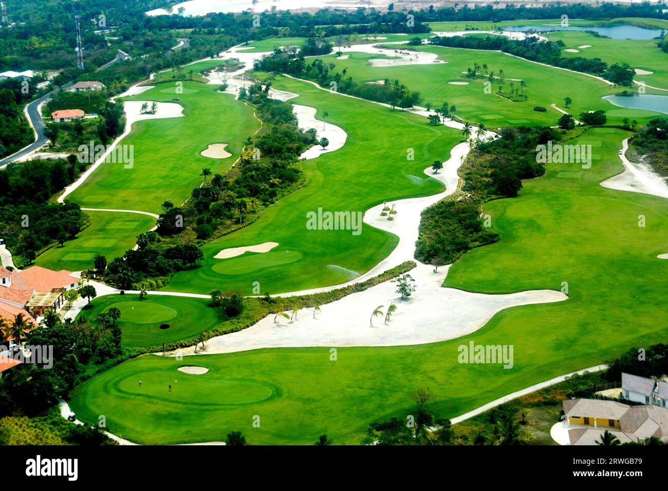 Flying above a golf course at an exotic destination Stock Photo - Alamy