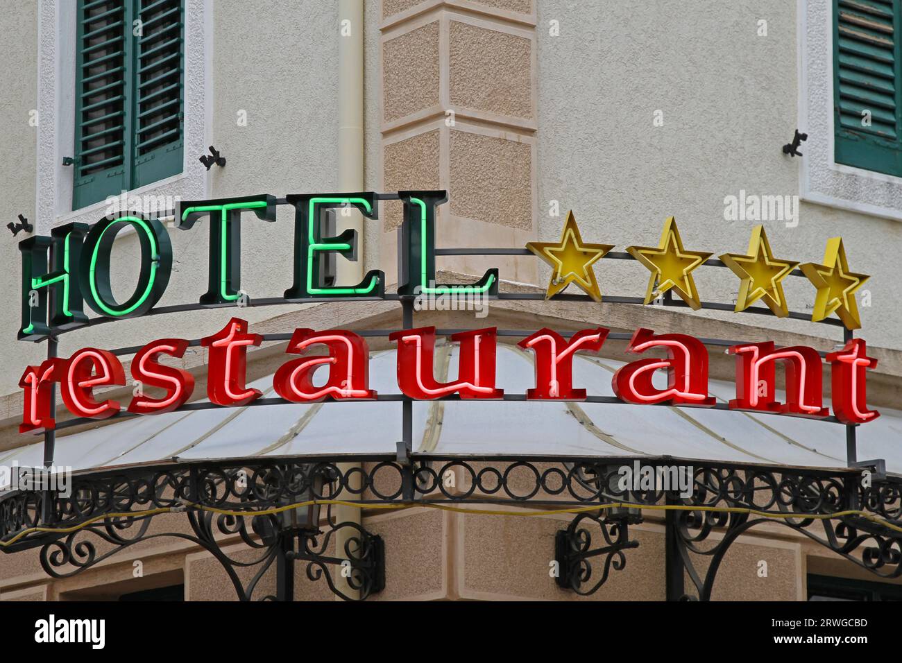 Four Star Hotel and Restaurant Sign Colour Neons Travel Stock Photo - Alamy