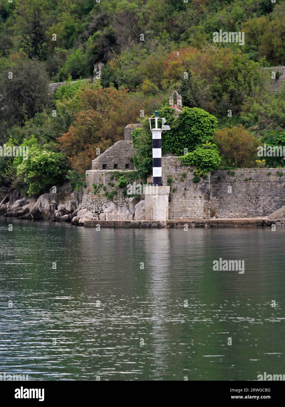 Black and White Lighthouse Pillar at Entrance to Boka Kotorska Bay in ...
