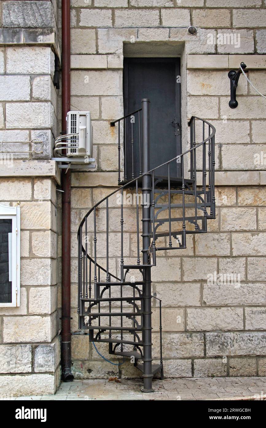 Metal Spiral Helix Staircase at Building Exterior Stock Photo - Alamy