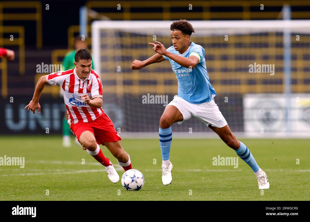 Manchester City's Max Alleyne and Red Star Belgrade's Jovan Sljivic ...