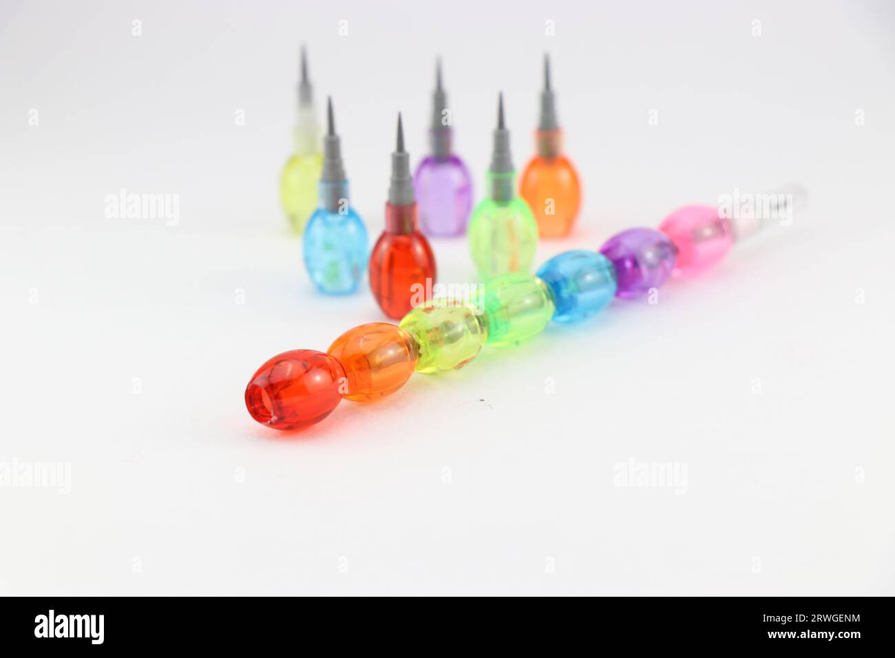 Fancy colorful writing pencils with refills that can stack upon each ...