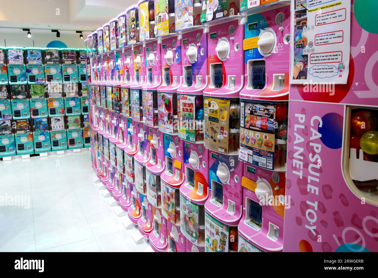Rows of Gachapon Capsule Toy Machines Stock Photo - Alamy