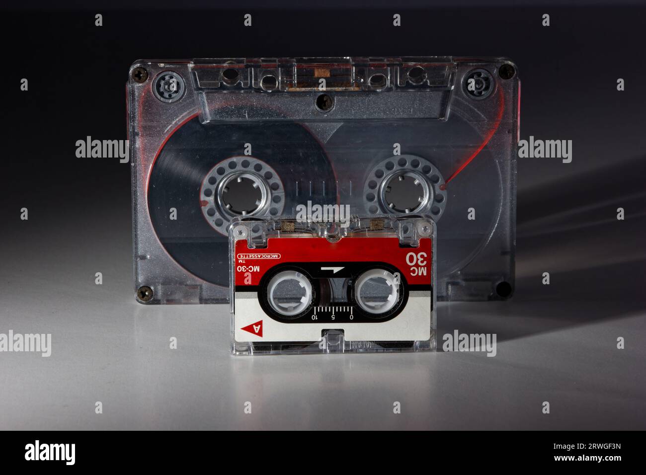 vintage analog audio compact and micro cassette with transparent case ...