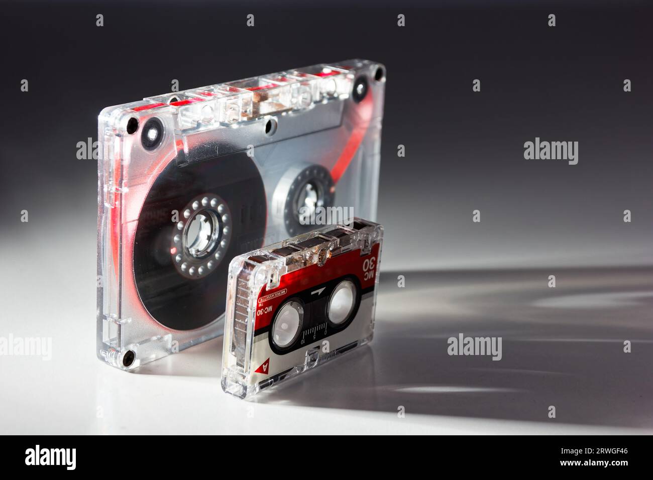 vintage analog audio compact and micro cassette with transparent case ...