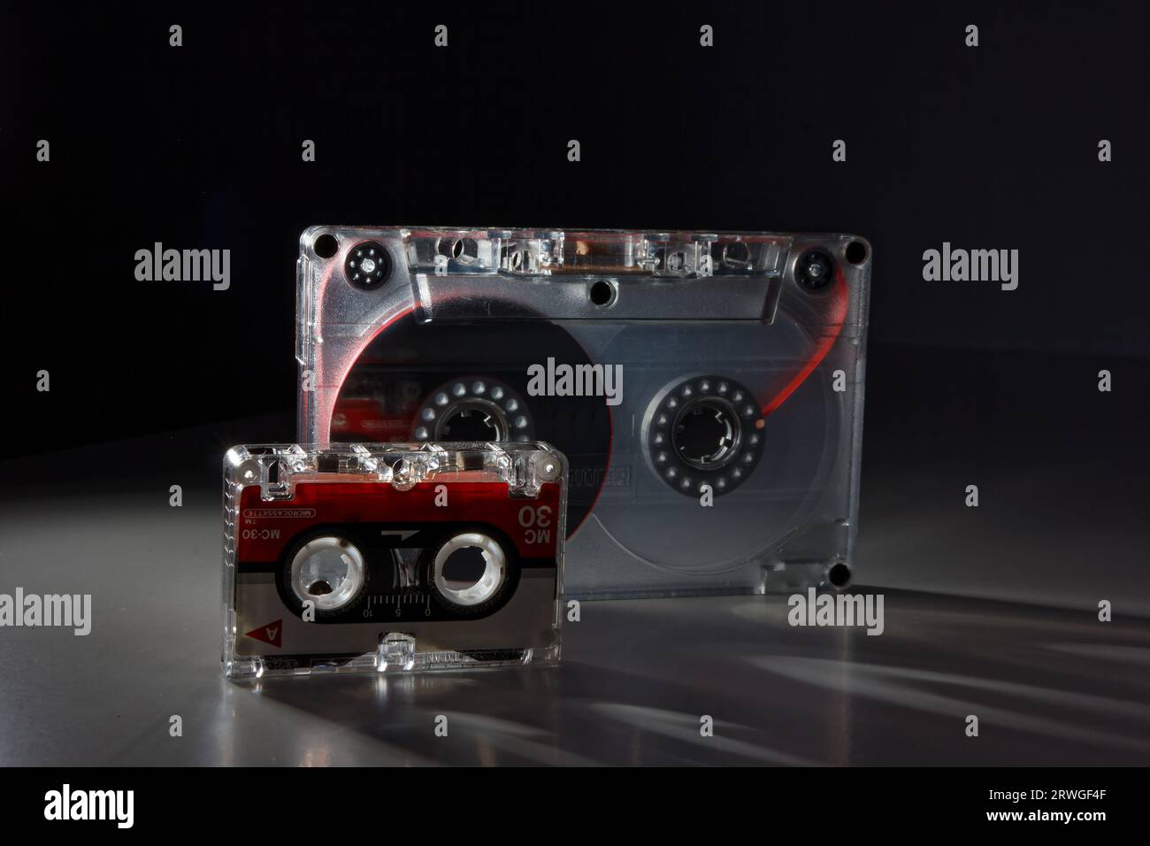 vintage analog audio compact and micro cassette with transparent case ...