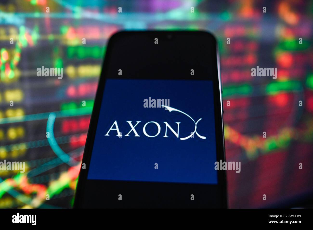 In this photo illustration, a Axon logo seen displayed on a smartphone ...