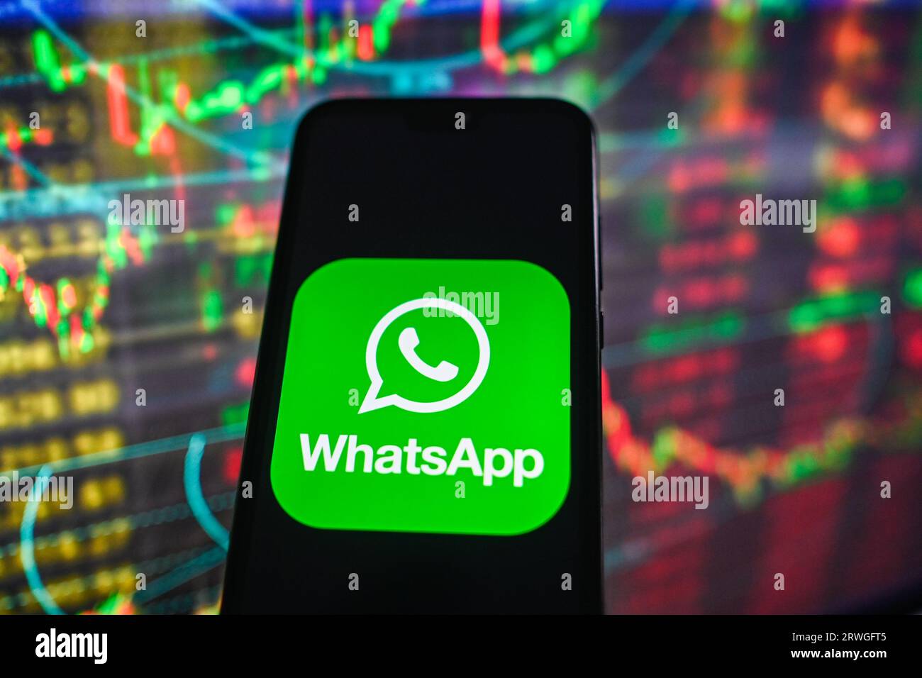 In this photo illustration, a WhatsApp logo seen displayed on a ...