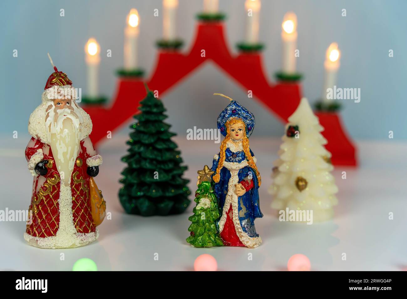 Santa Claus, Snow Maiden and Christmas tree. Celebrating the New Year ...