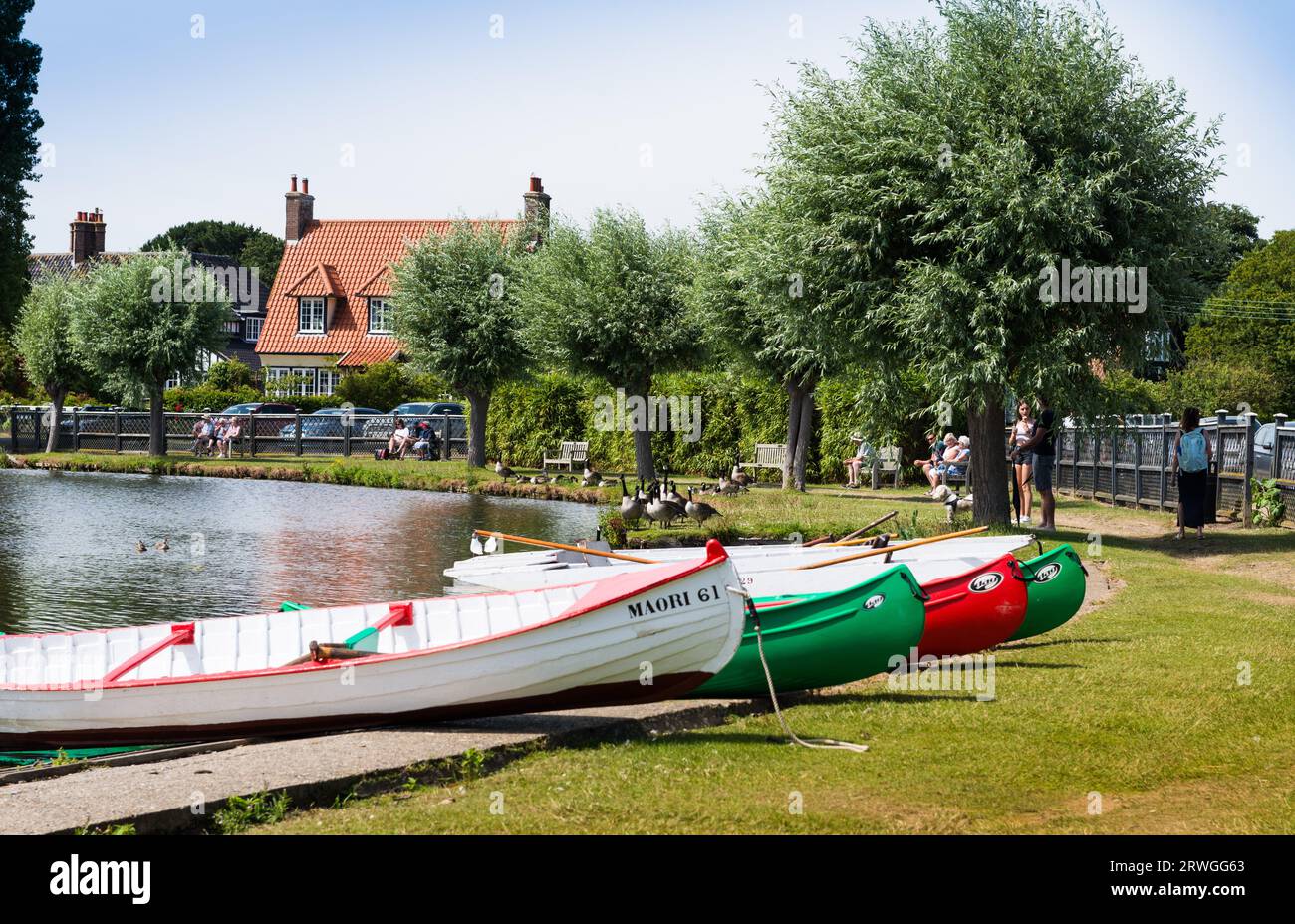 Rowing boats on the meare boating lake at thorpeness hi-res stock ...