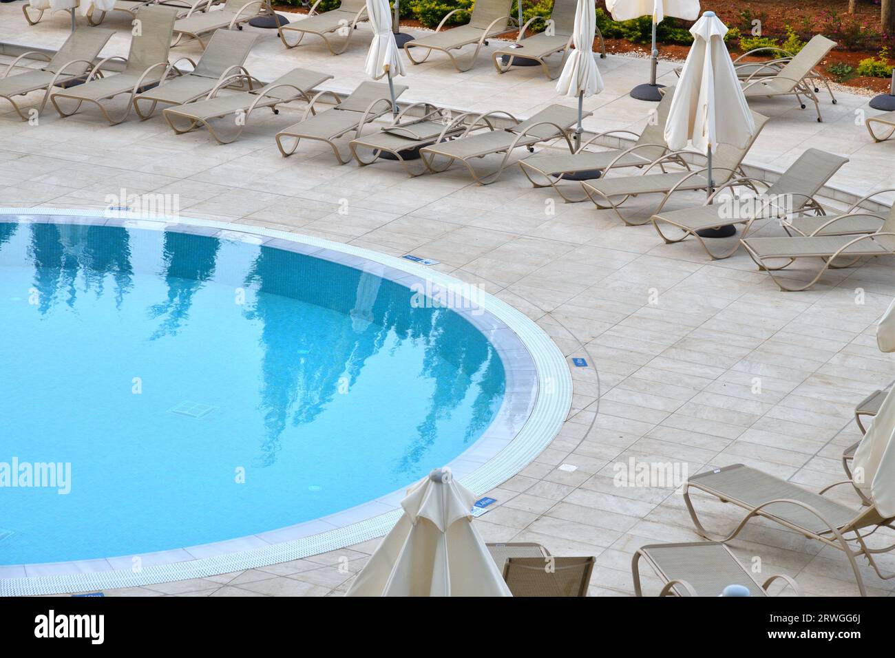 Swimming pool 1.4 meters deep and the sun loungers around Stock Photo ...
