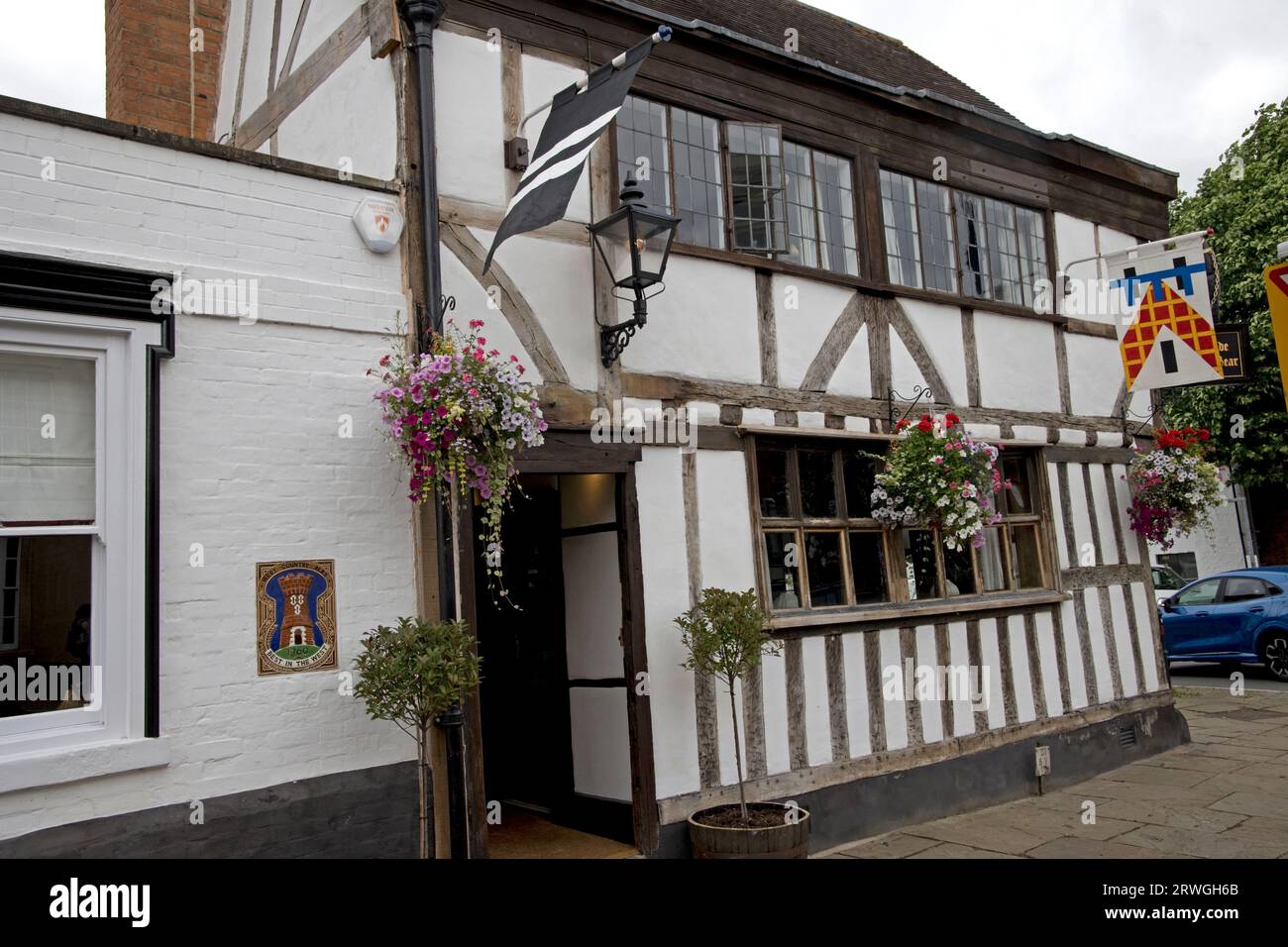 The origin of Ye Olde Black Bear public house at the junction of High ...