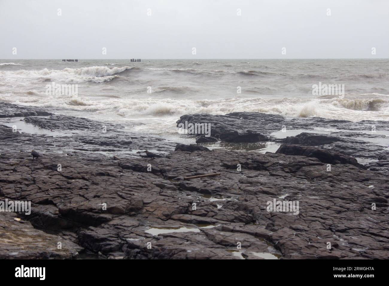 Rocky beach along the Arabian sea coast, Bandstand Promenade in Bandra ...