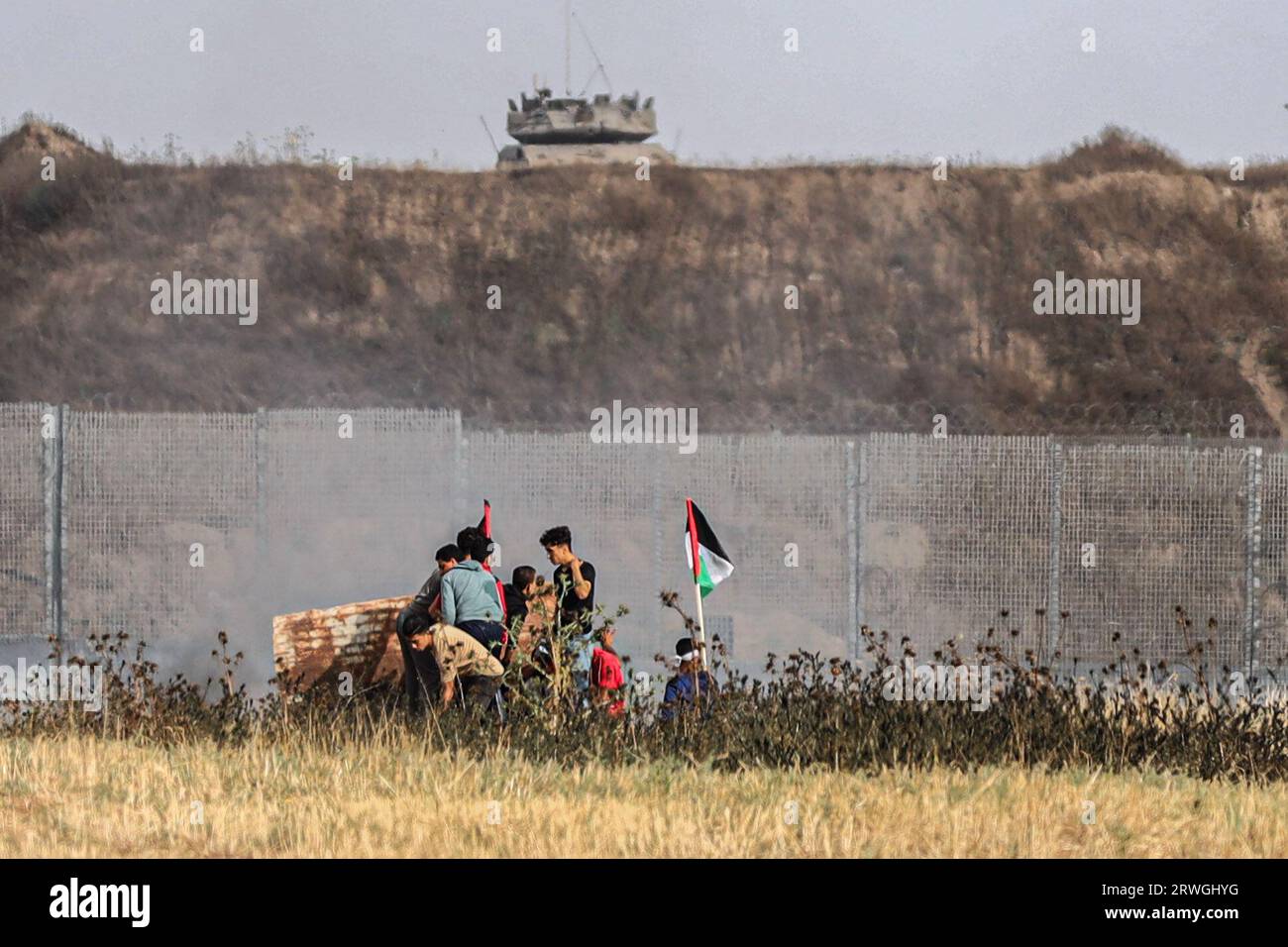 Gaza, Gaza, Palestine. 19th Sep, 2023. Palestinian youths hide from an ...