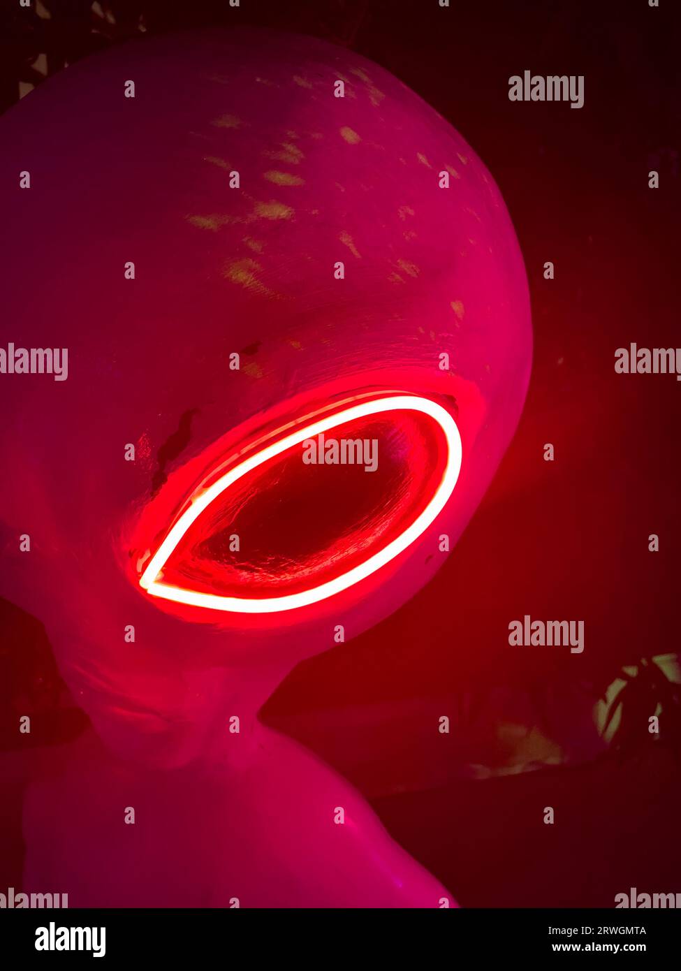 The red glowing eye of an alien Stock Photo - Alamy