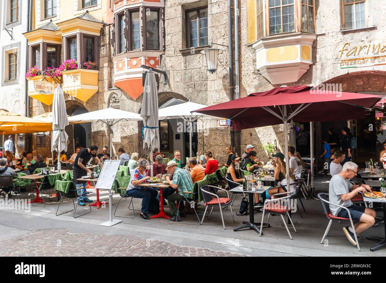 Bolzano Cafe street city summer people Stock Photo - Alamy