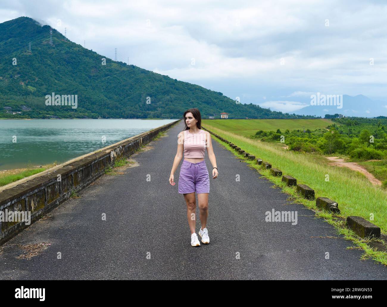 Young russian woman traveler with depressed and sad face walking alone ...