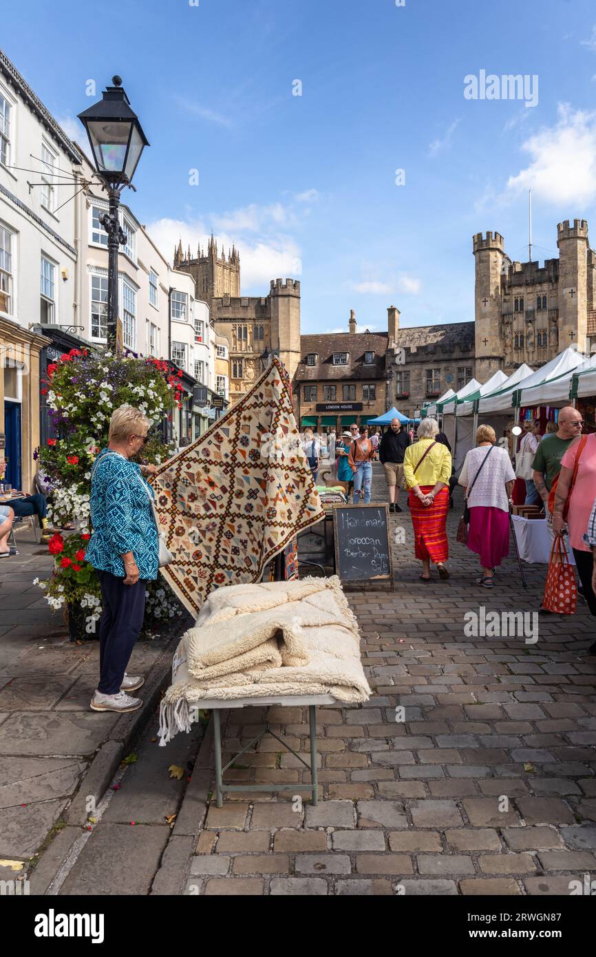 Market day in Wells Market Place on a sunny September day with people ...