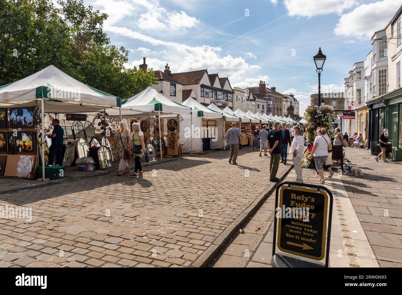 Market day in Wells Market Place on a sunny September day with people ...
