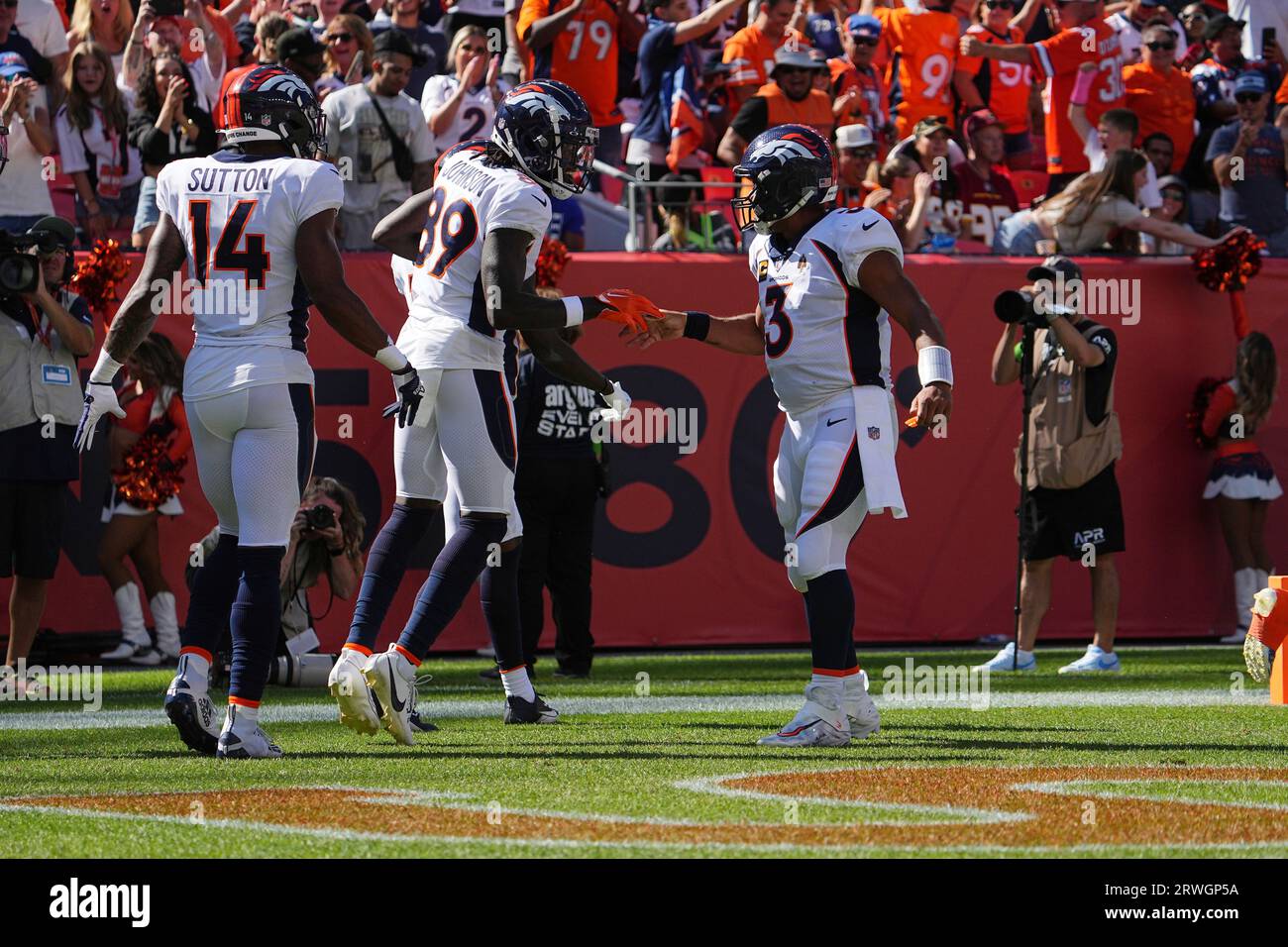 Denver Broncos wide receiver Brandon Johnson (89) scores a touchdown ...