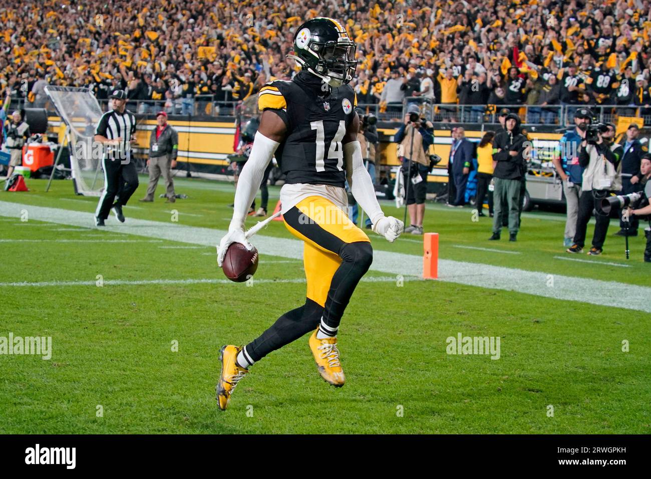 Pittsburgh Steelers wide receiver George Pickens runs into the end zone ...