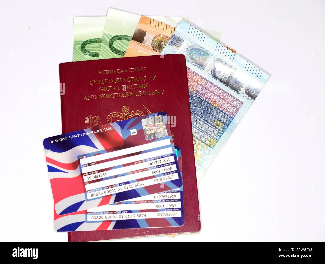 Passport, Euros and uk Global Health Insurance Card Stock Photo - Alamy